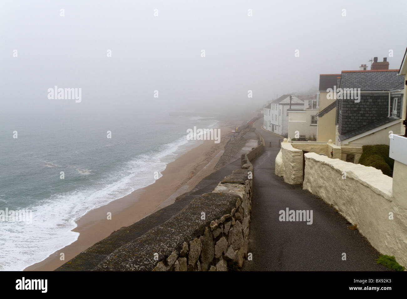 Fog at beach in Porthleven, Cornwall, UK Stock Photo - Alamy