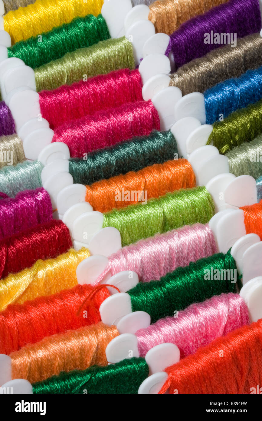 Coloured threads on bobbins hi-res stock photography and images - Alamy