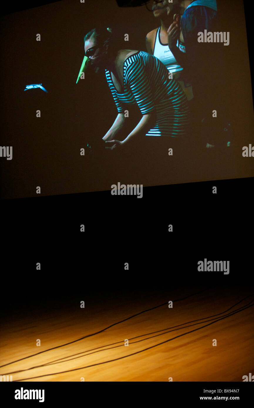 A dance performance is projected on a screen during a university class ...