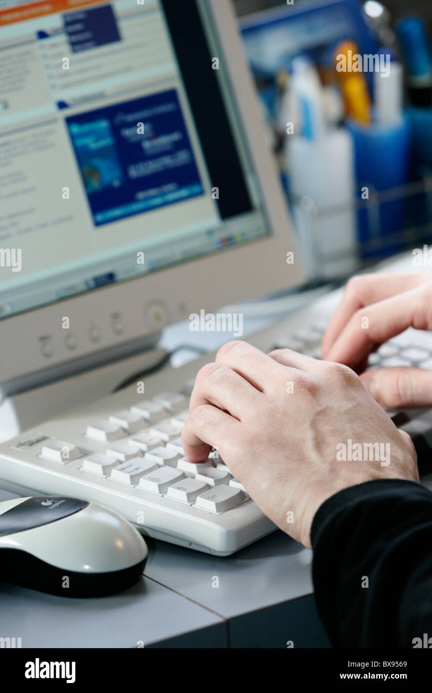 Hands on screen hi-res stock photography and images - Alamy