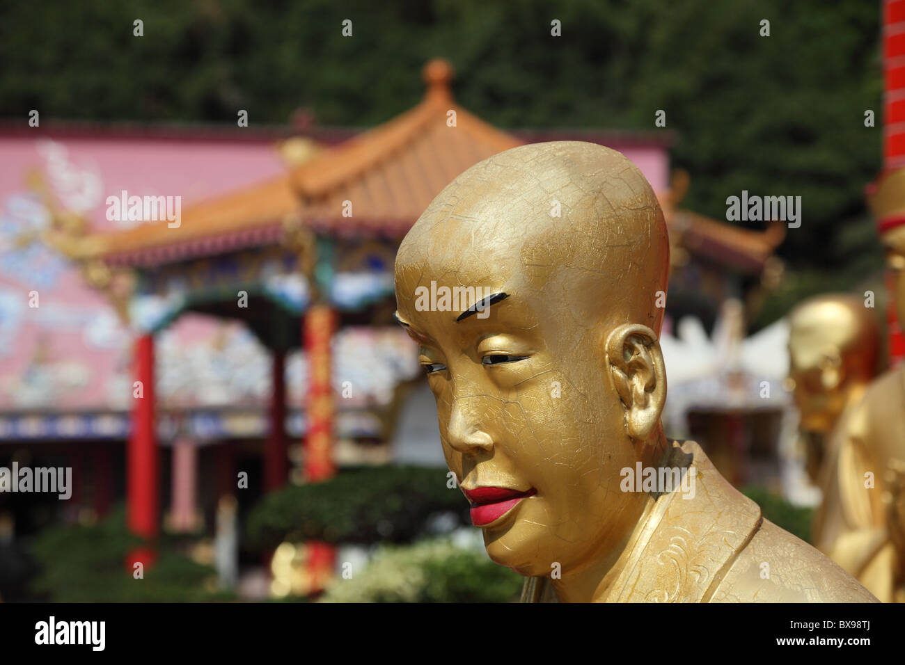 Golden monk statue hi-res stock photography and images - Alamy