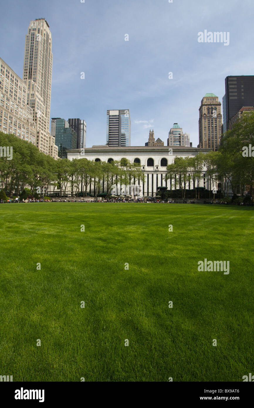 The lawn at Bryant Park on a summer's day with the New York Public ...