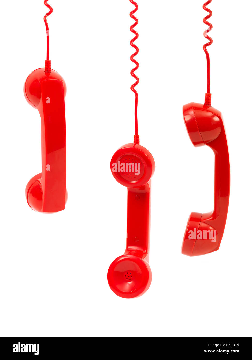 Hanging rotary telephone hand setsisolated against a white background ...