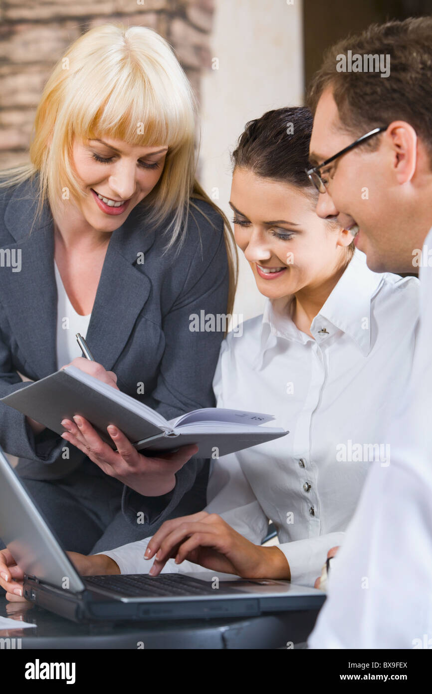 Business colleagues interacting other in hi-res stock photography and ...