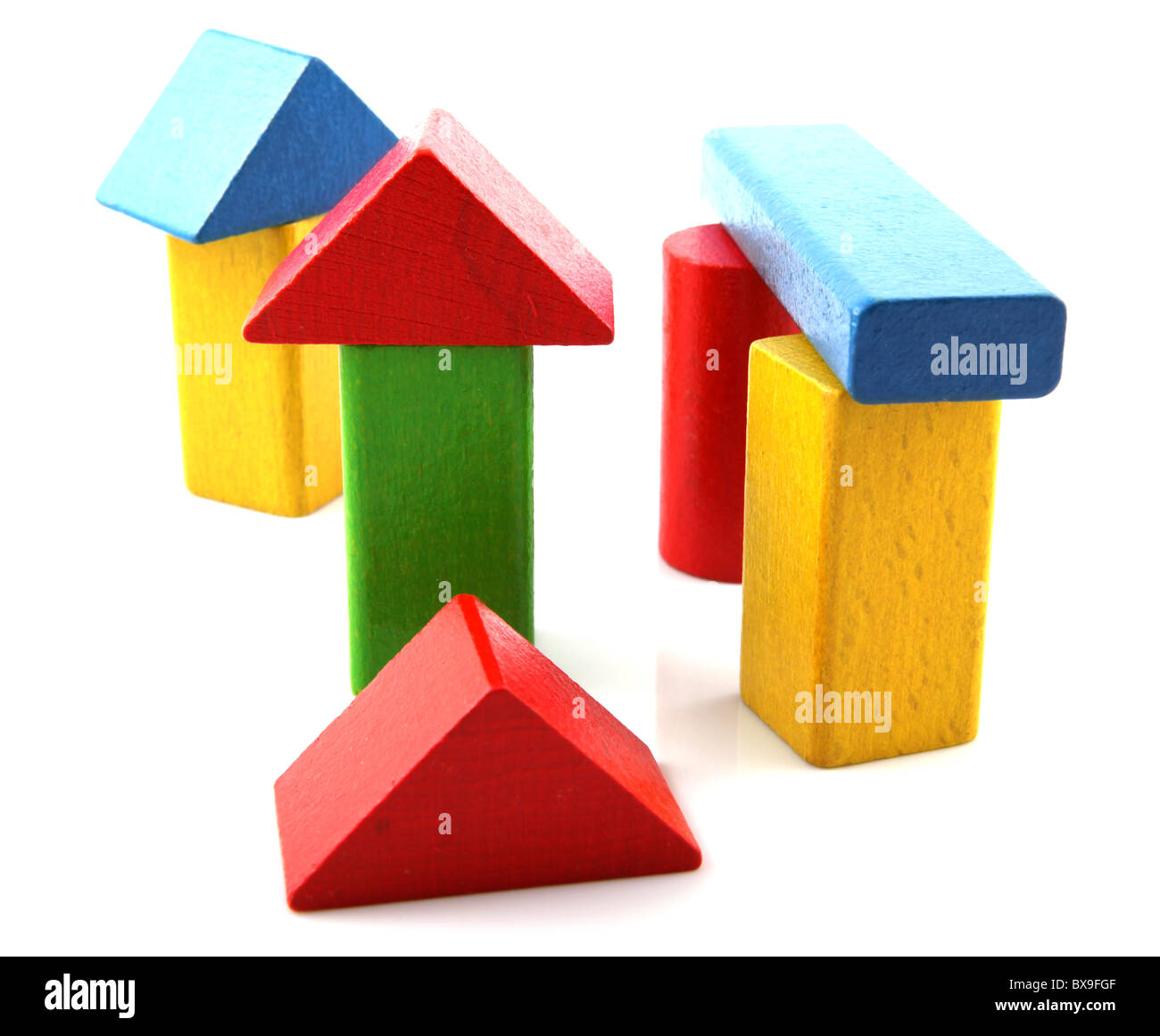 Wooden building blocks on white background Stock Photo - Alamy