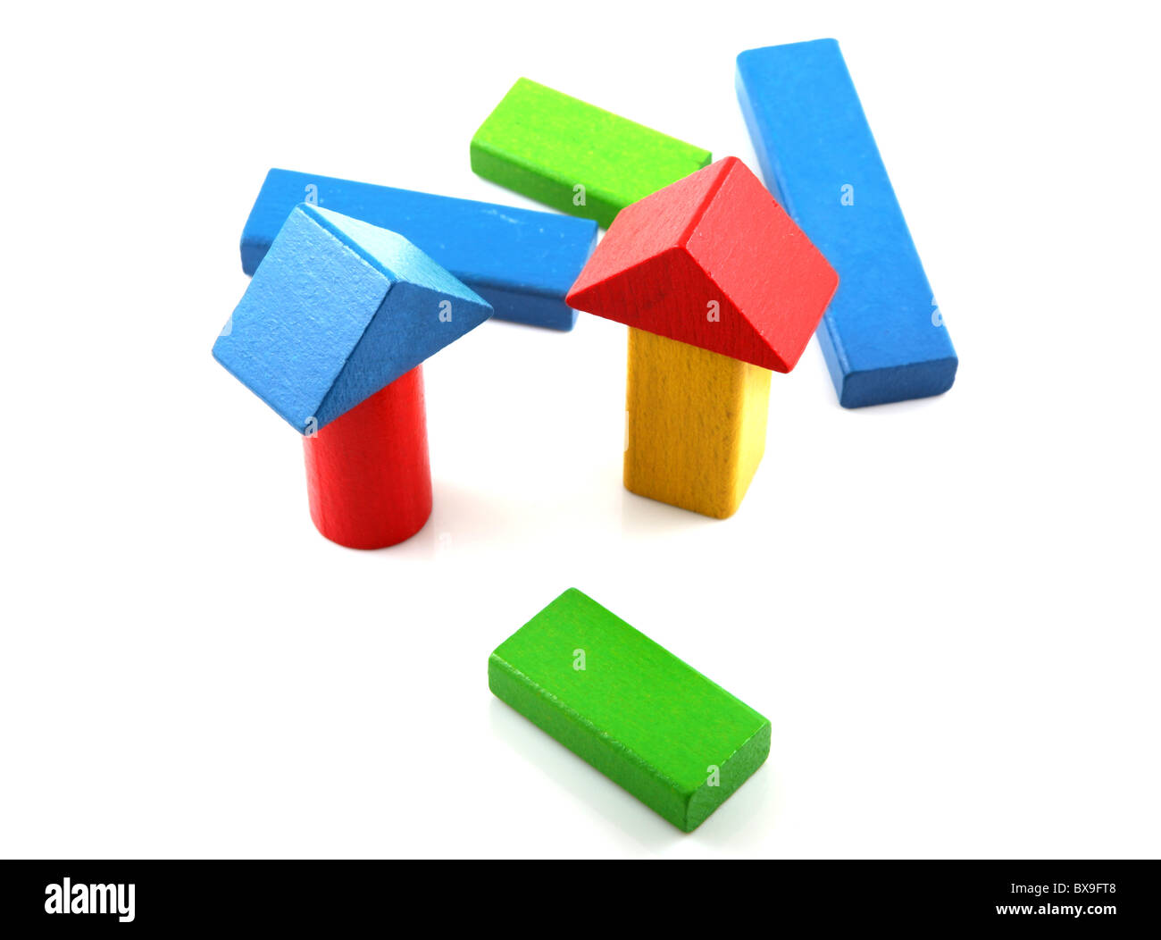 Wooden building blocks on white background Stock Photo - Alamy