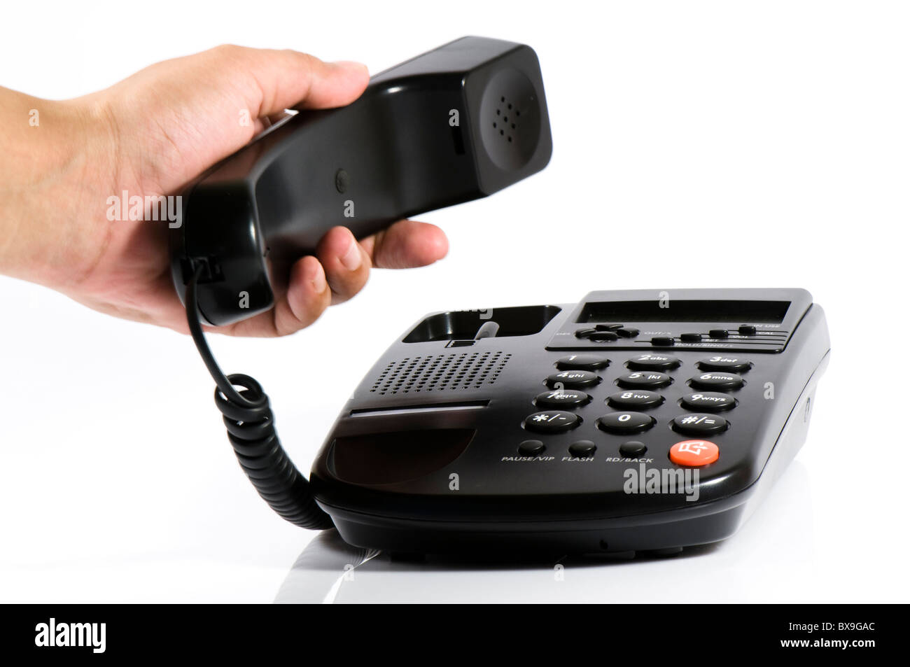 Picking phone receiver cutout, black telephone, white background Stock ...