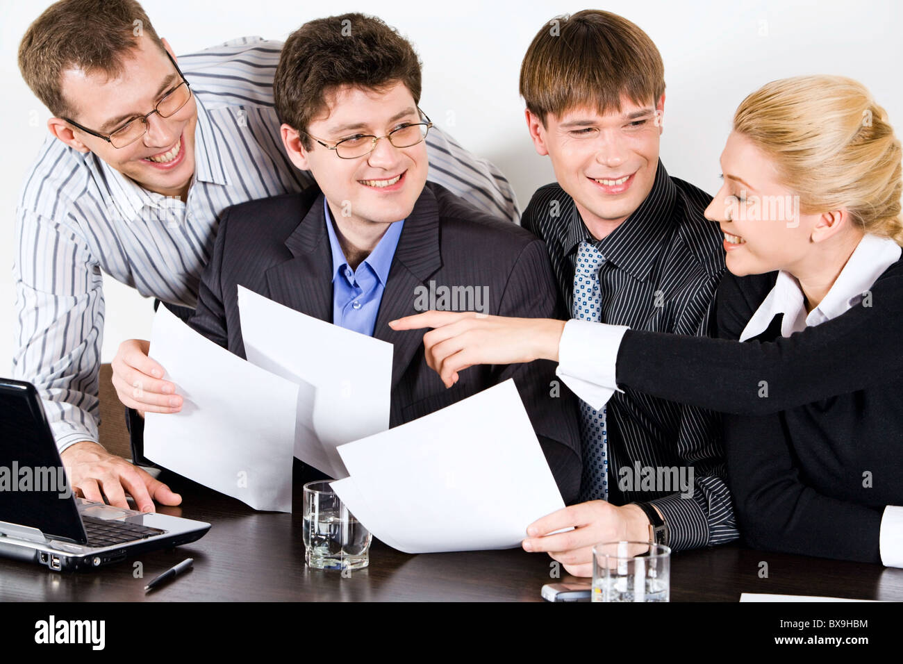 Photo of successful professionals interacting with each other Stock ...