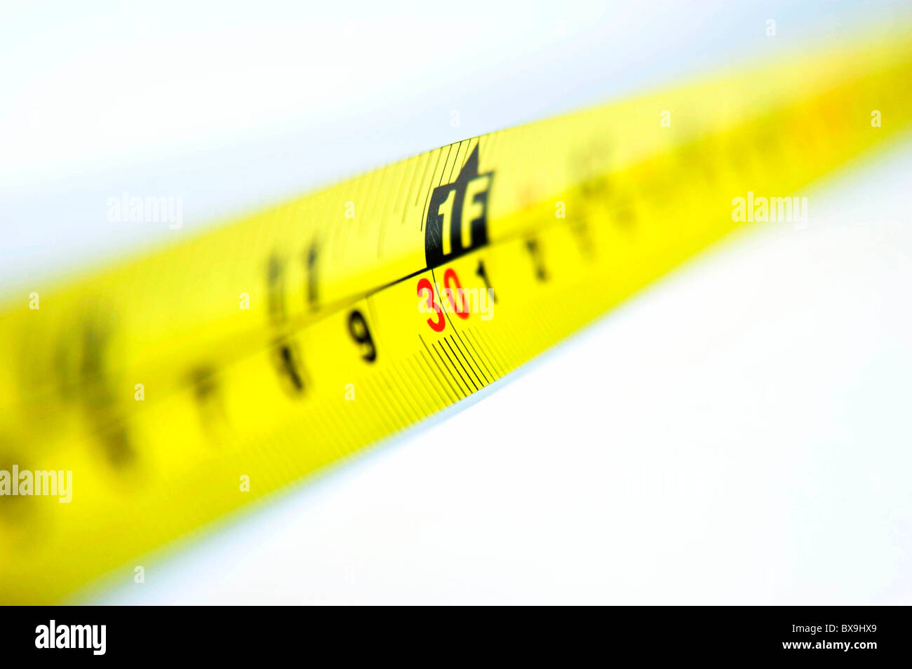 Close-up detail on a tape measure Stock Photo - Alamy
