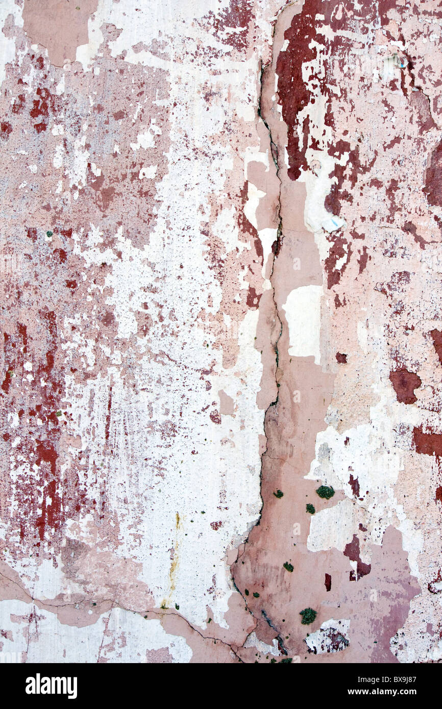 Severe paintless and cracked pink wall texture Stock Photo - Alamy