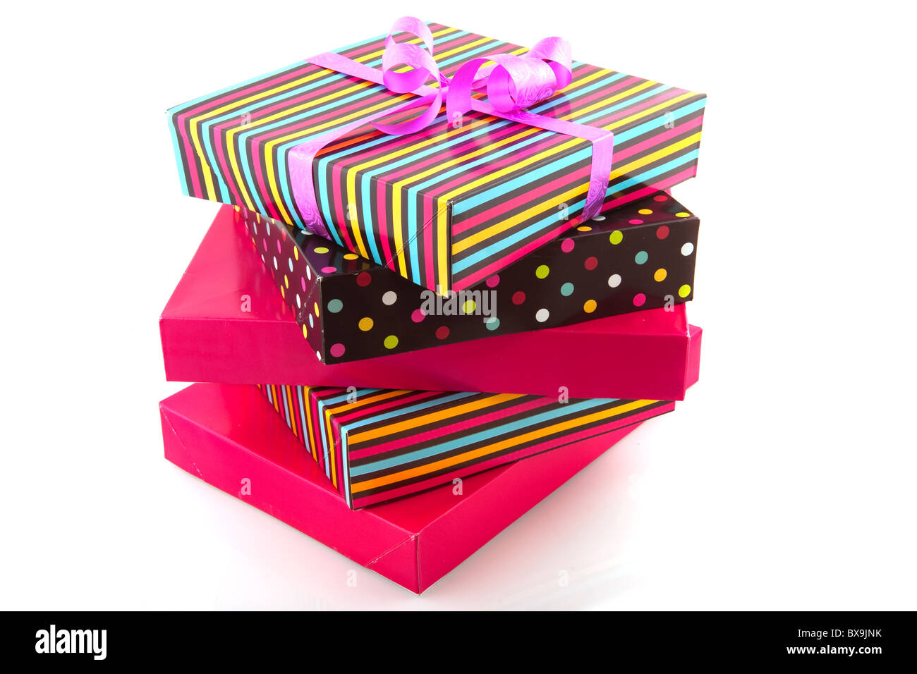 Big stack with many colorful presents isolated over white background ...