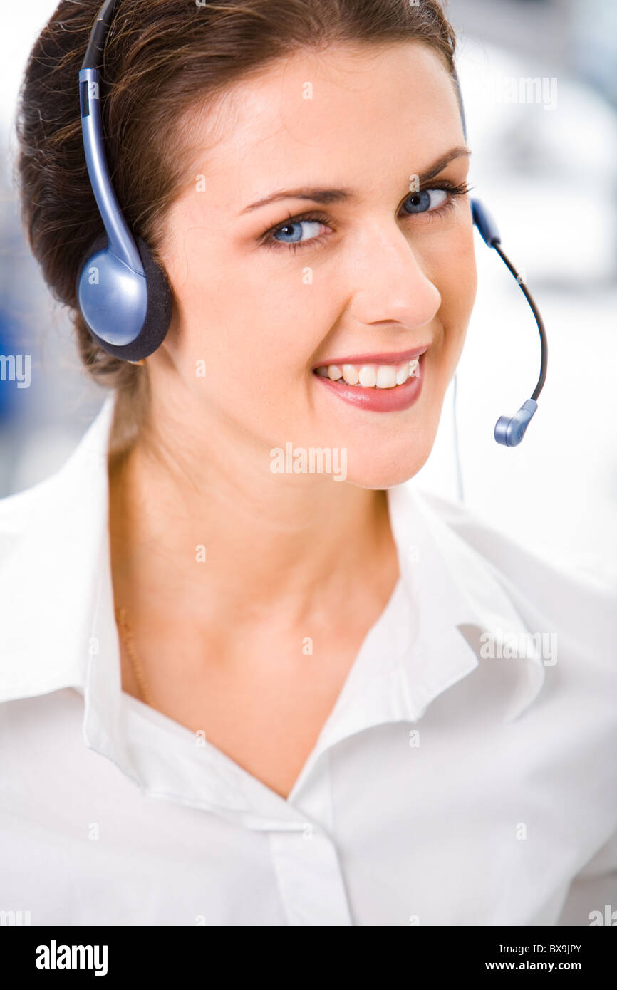 Portrait of beautiful customer service representative with wonderful ...