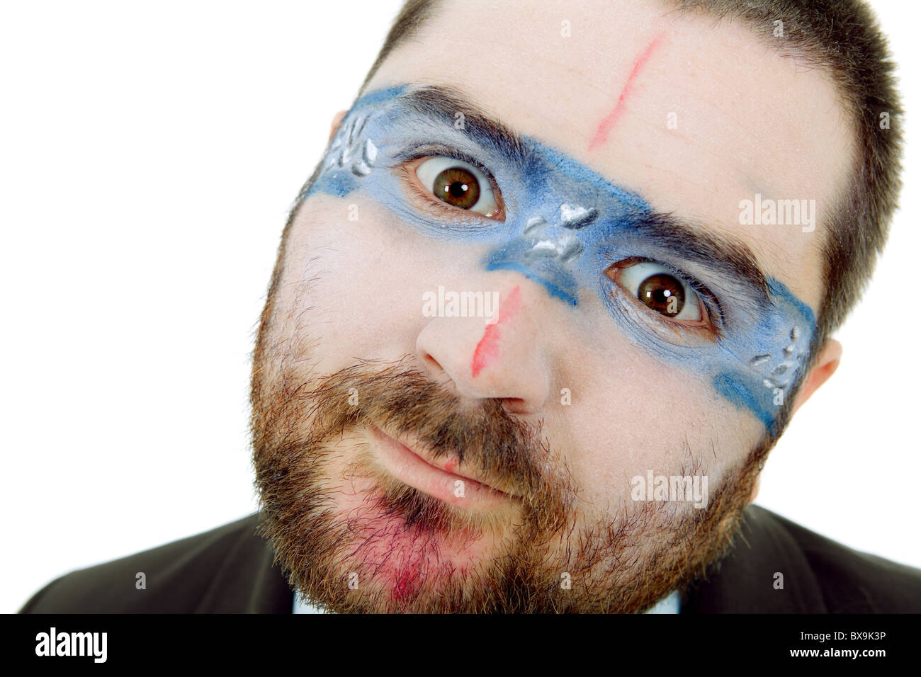 young silly man with a strange painted face, isolated Stock Photo - Alamy