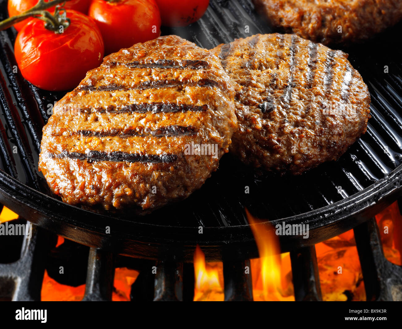 Beef burgers being cooked. Food photos, pictures & images Stock Photo ...