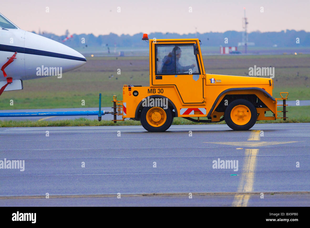 Aircraft tow tractor hi-res stock photography and images - Alamy