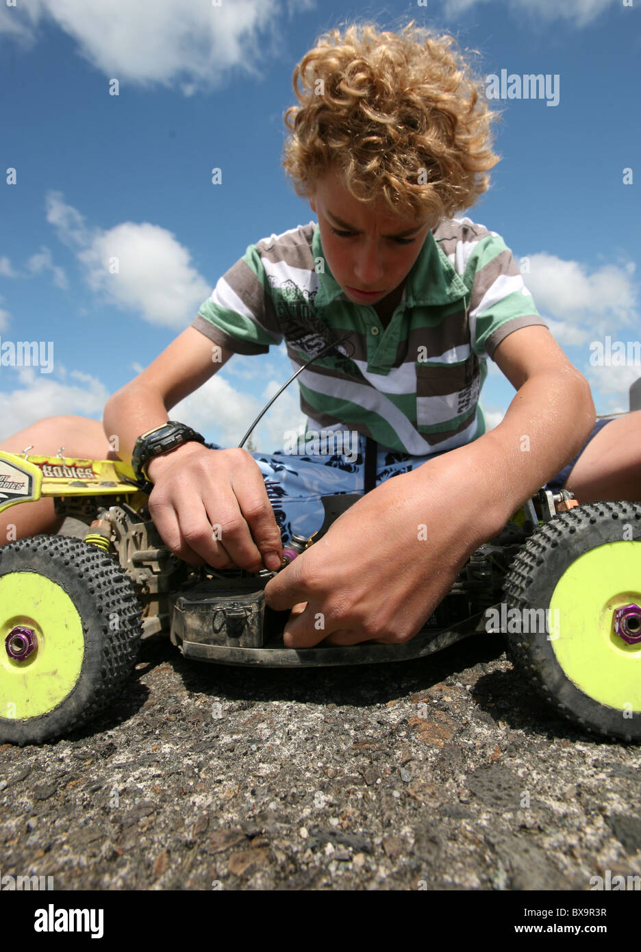Boy with car Stock Photo - Alamy