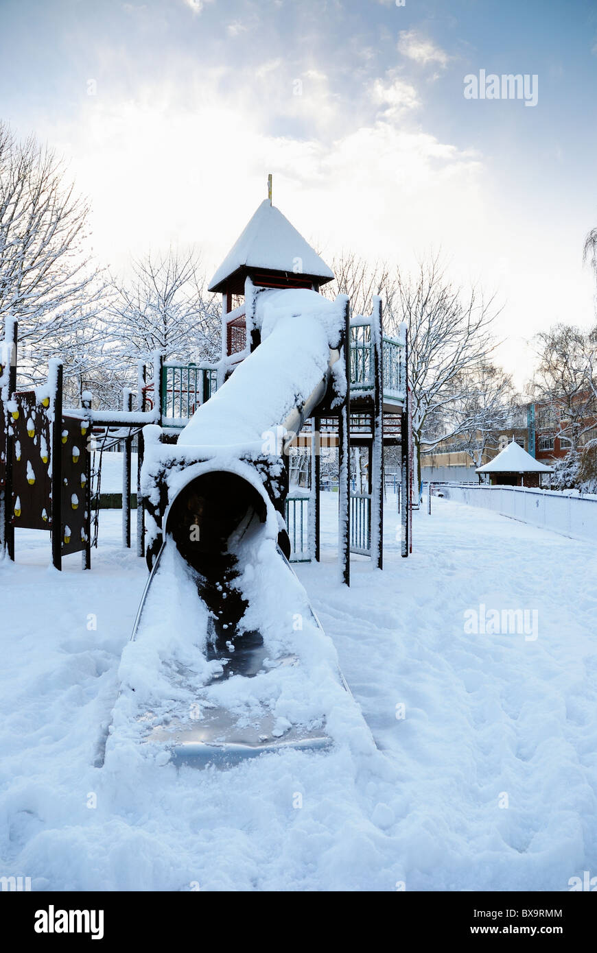 slide in local park covered in heavy snow Stock Photo - Alamy