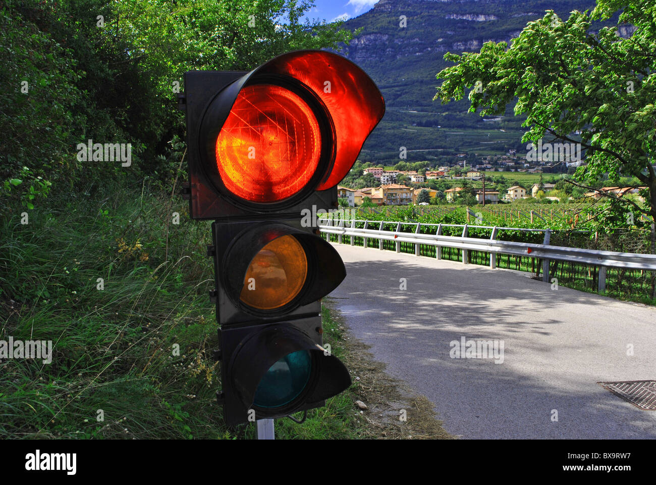 rural road with red lights Stock Photo - Alamy