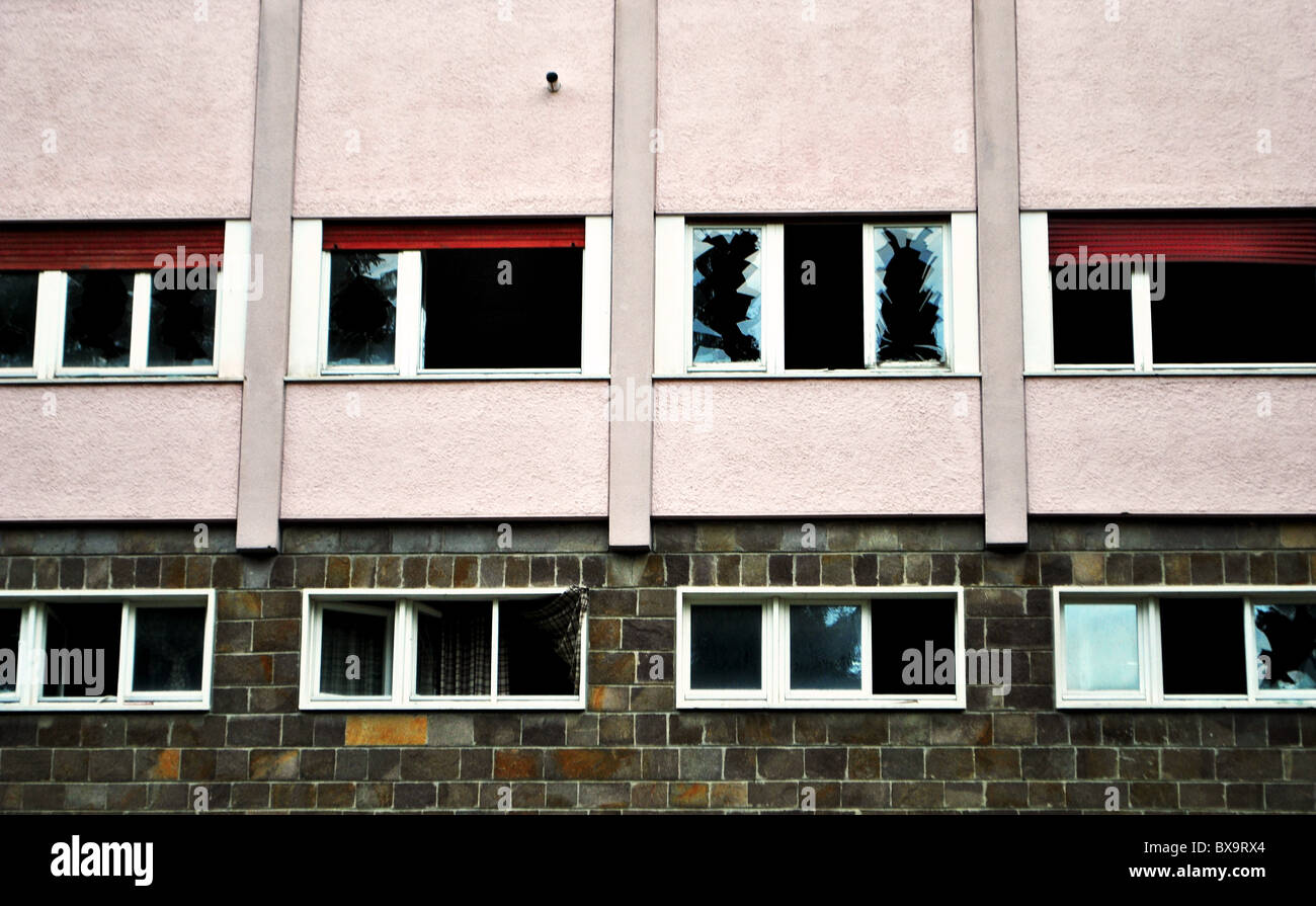 abandoned building with windows and broken glass Stock Photo - Alamy