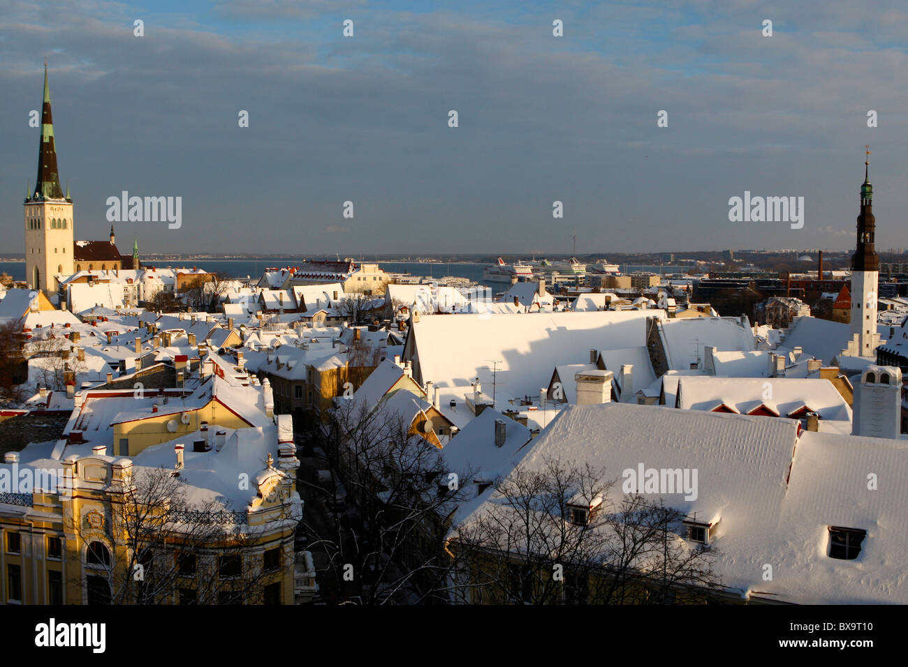 Snowy roofs in Talin's old town with the port in the background ...