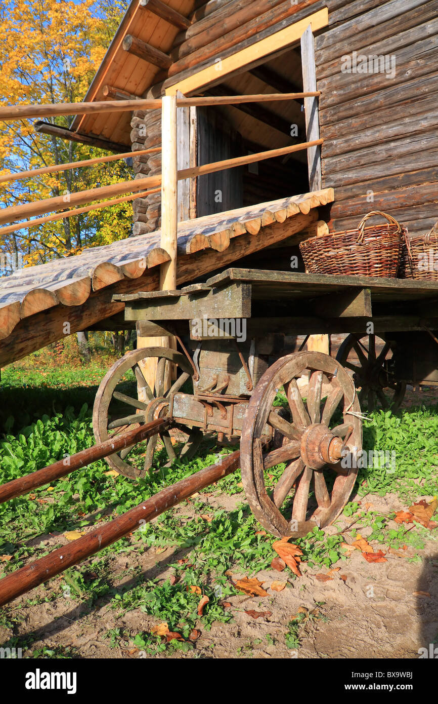 aging cart near wooden barn Stock Photo - Alamy