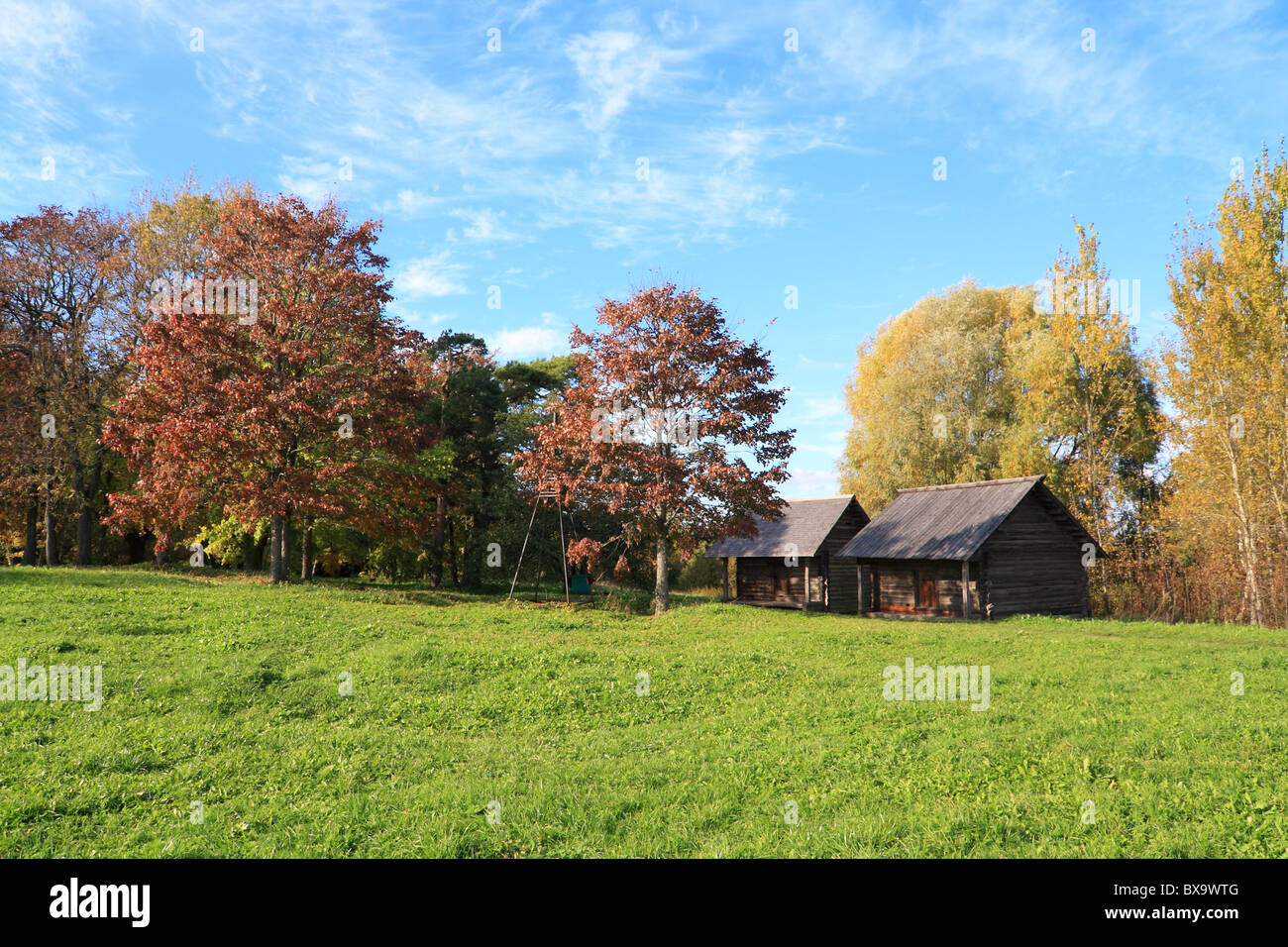 wooden buildings amongst autumn tree Stock Photo - Alamy