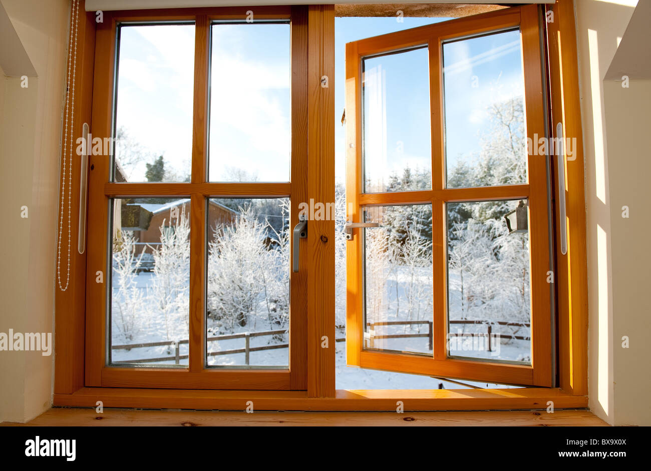 Early morning frosty winter view through a window Stock Photo - Alamy