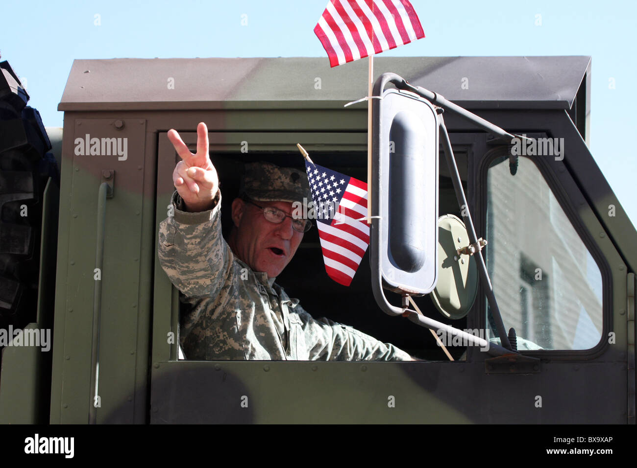 Peace symbol from a soldier in the Veterans Day Parade Milwaukee ...