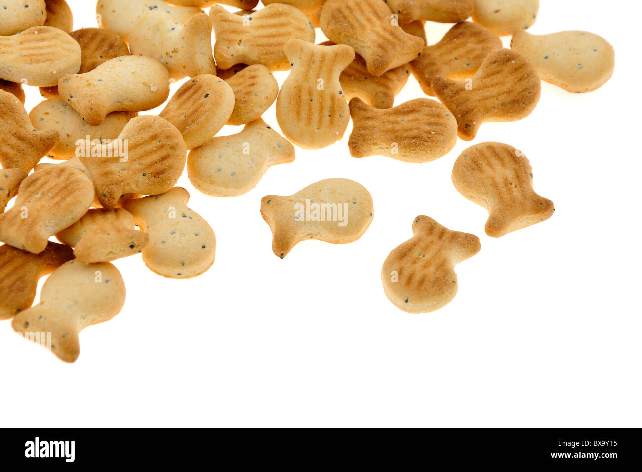 Fish shaped snacks isolated on white background Stock Photo - Alamy