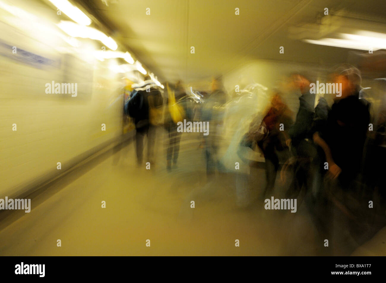 Abstract moving figures in subway Stock Photo - Alamy
