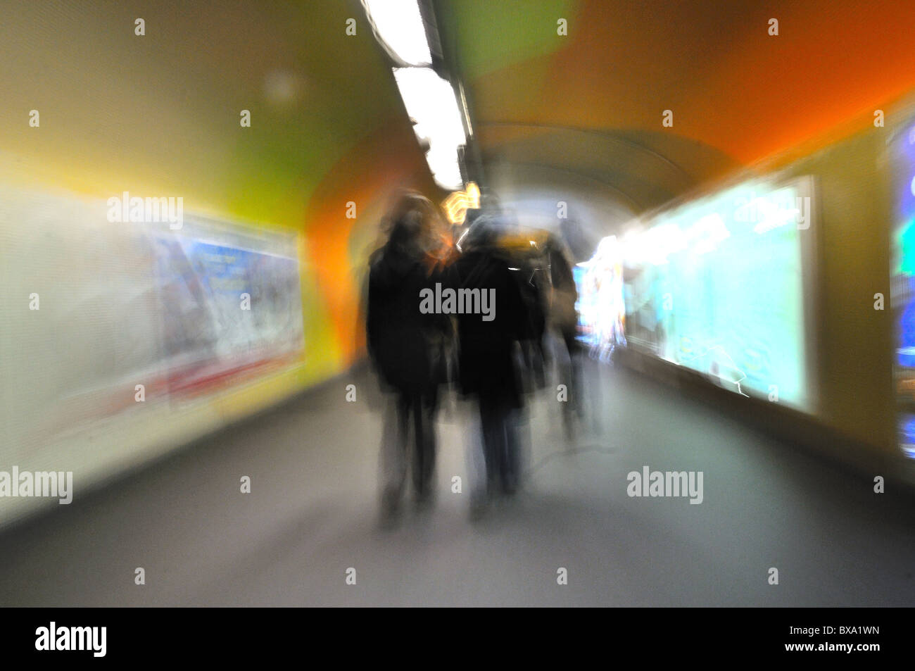 Abstract moving figures in subway Stock Photo - Alamy