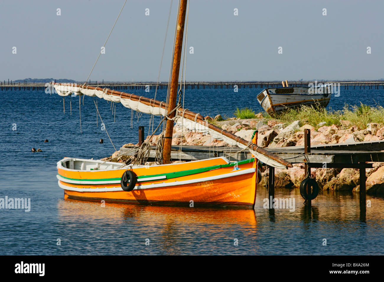 Dock with old boat hi-res stock photography and images - Alamy