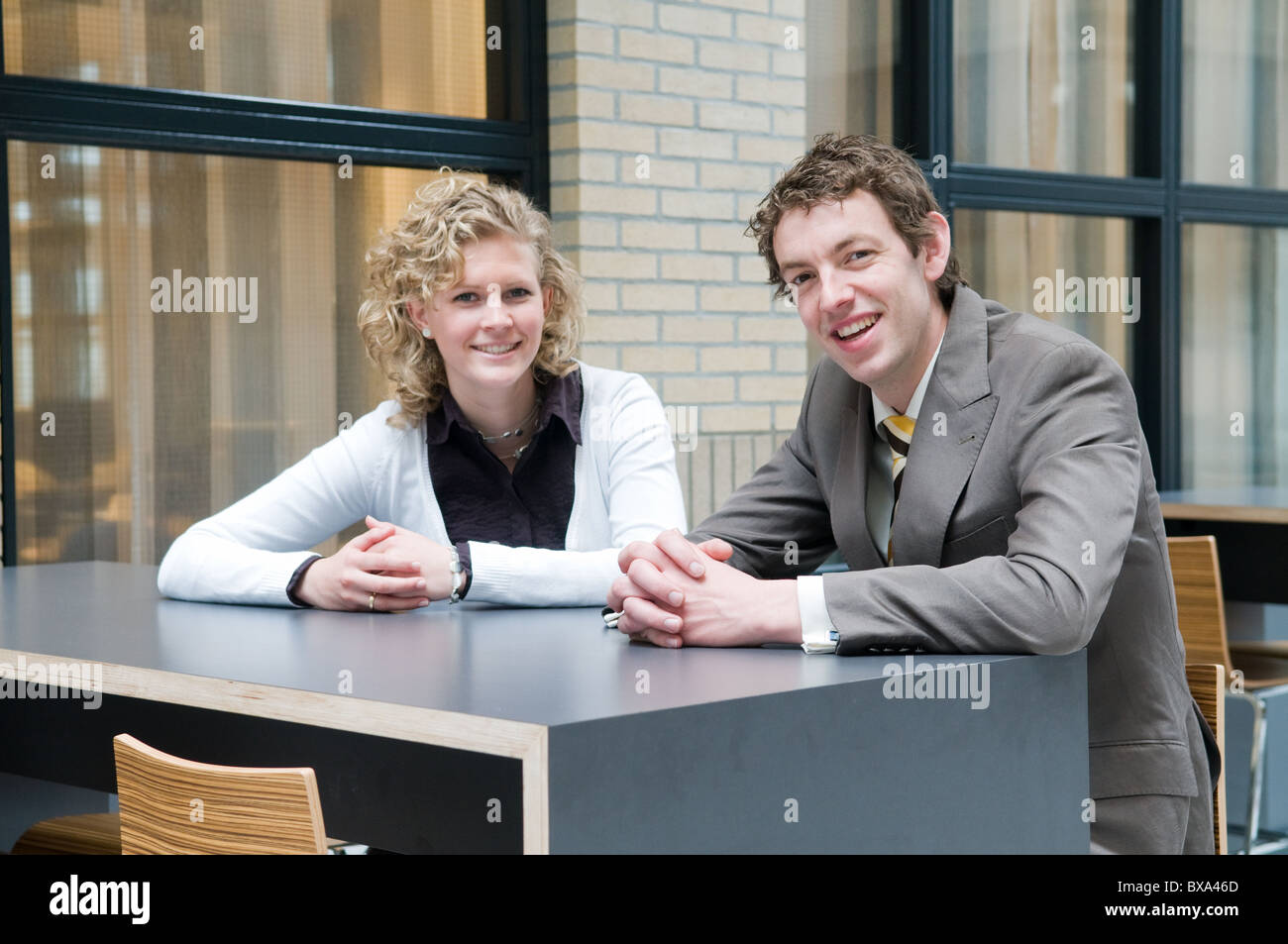 Two business people having a business meeting Stock Photo - Alamy