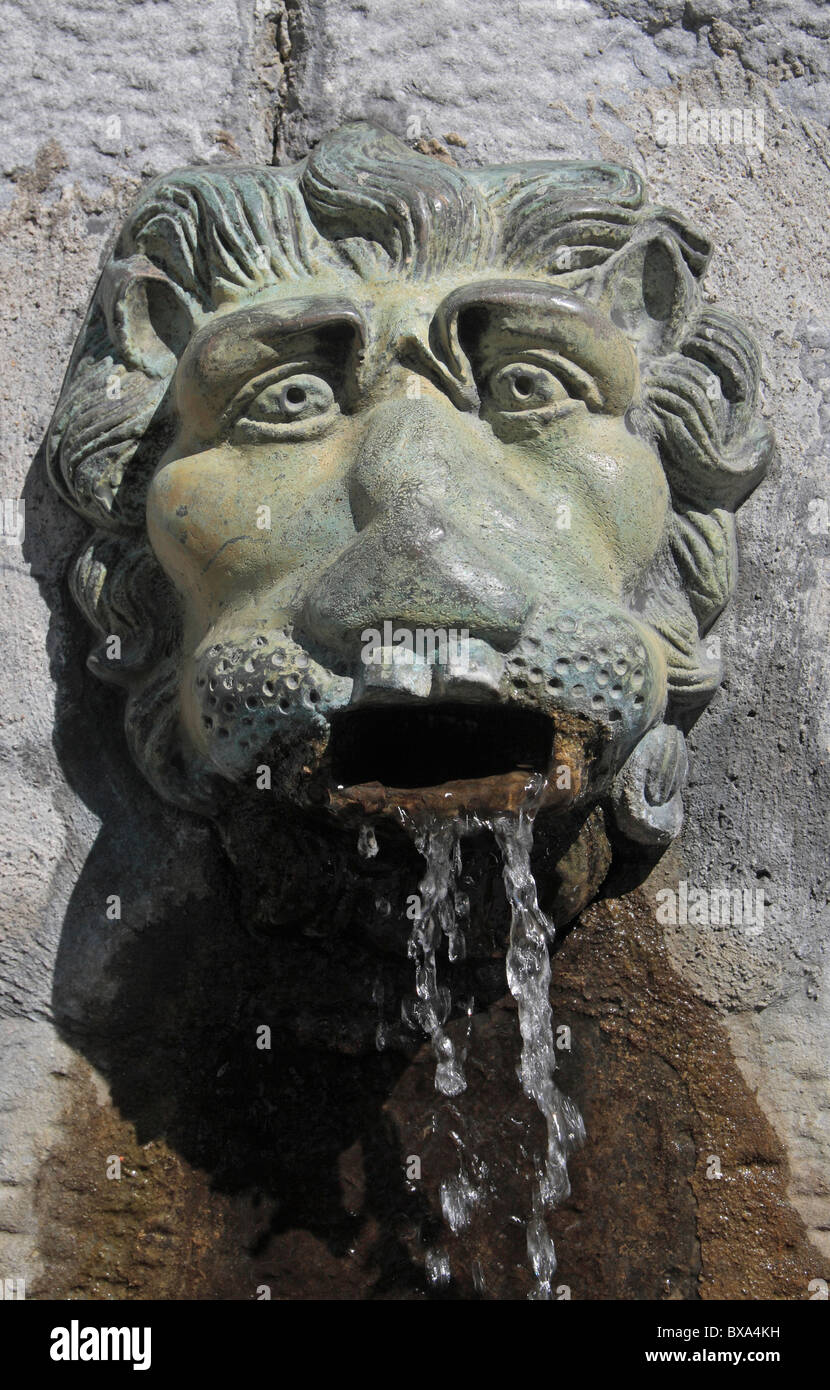 Close up of a gargoyle on the Back of the Pipes fountain in Cashel, Co ...