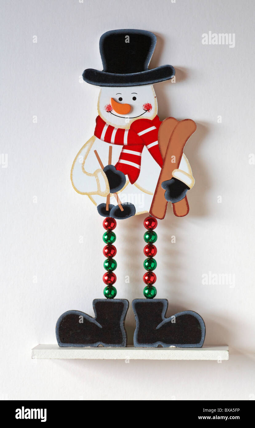 Snowman holding skis hi-res stock photography and images - Alamy