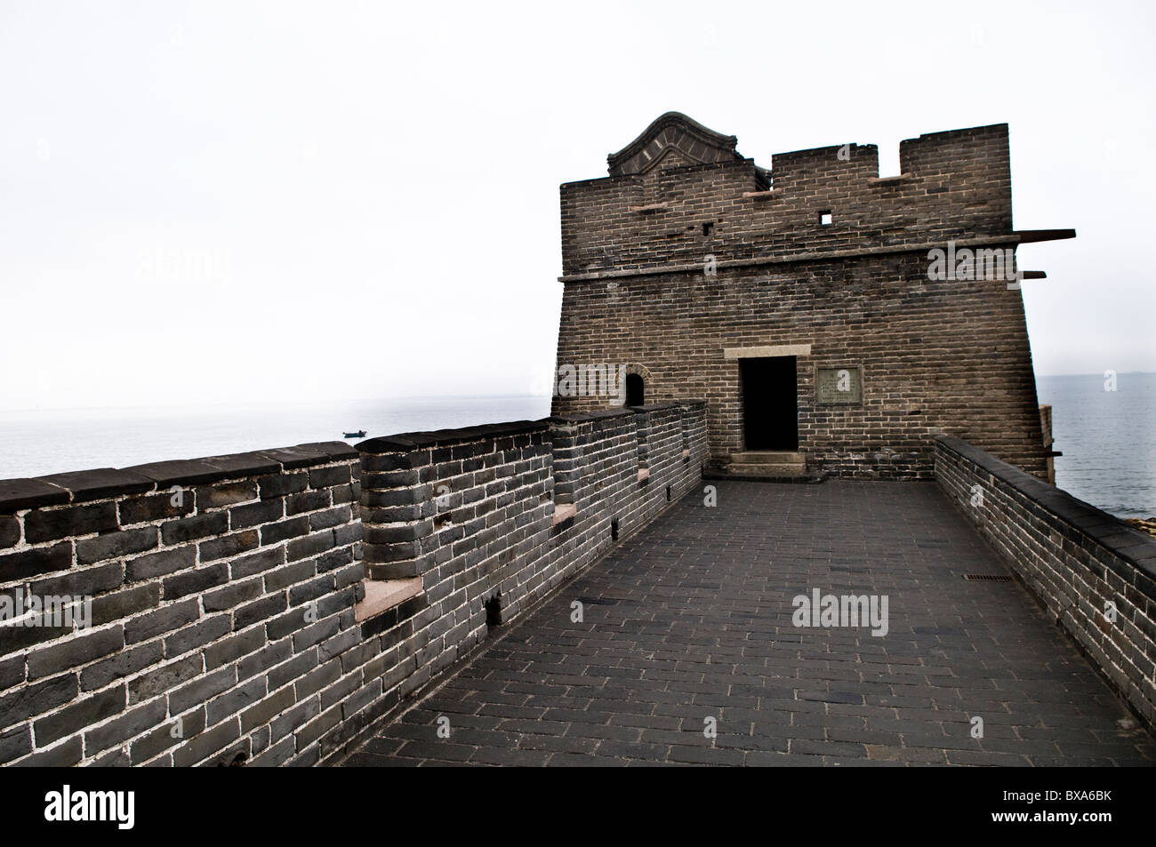 The great wall of China meets the ocean in Shanhaiguan Stock Photo - Alamy