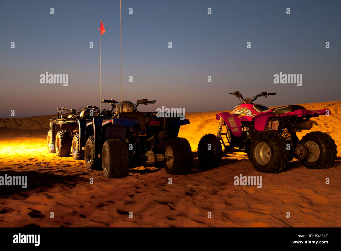 Quad bikes at sunset, Dubai Stock Photo - Alamy