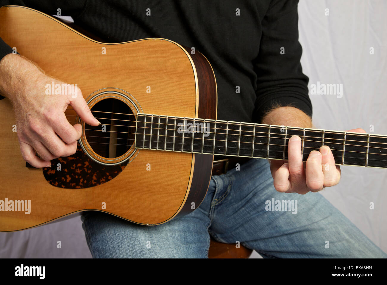 Man playing guitar. Face not shown Stock Photo - Alamy