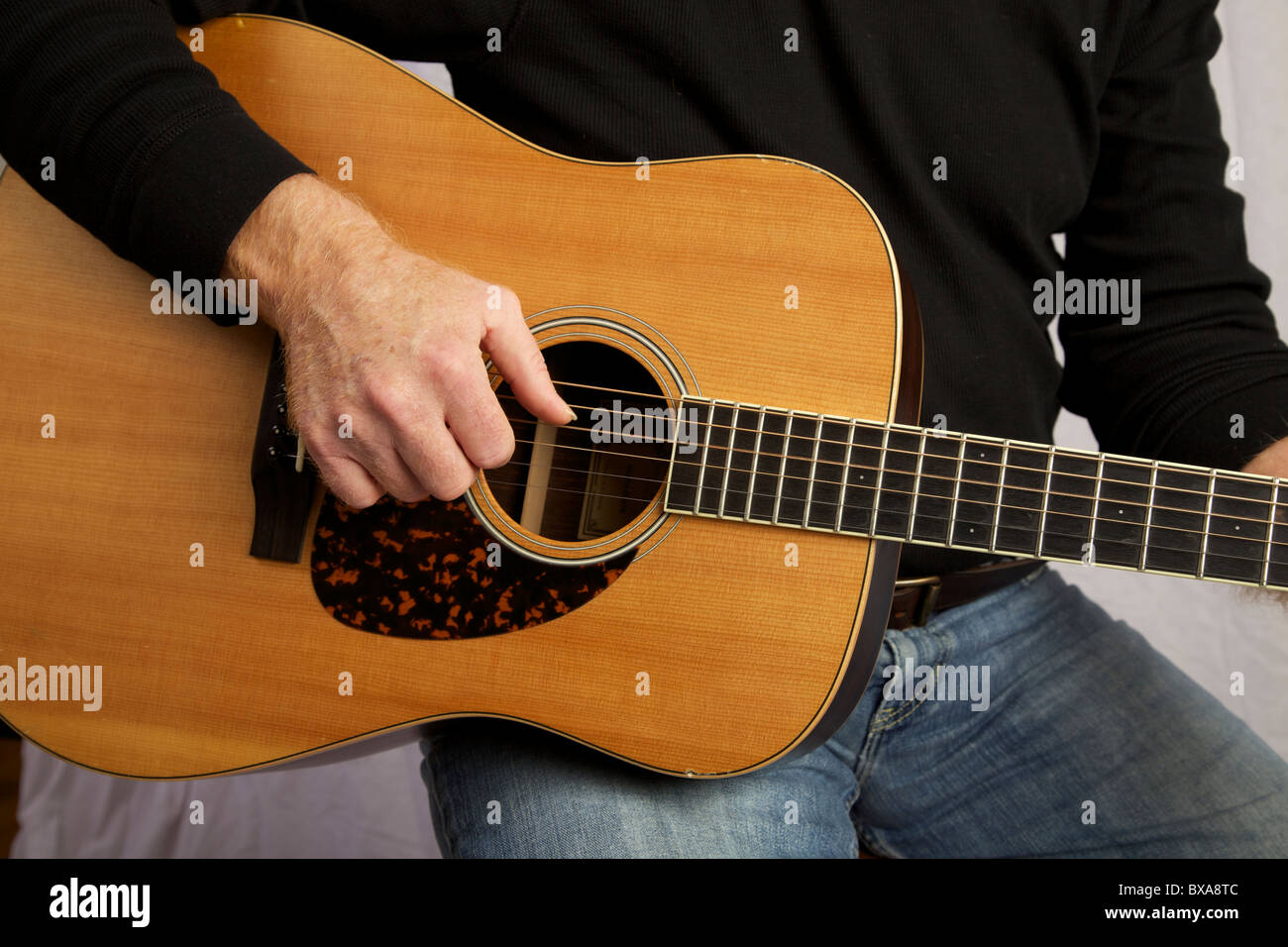 Man playing guitar. Face not shown Stock Photo - Alamy