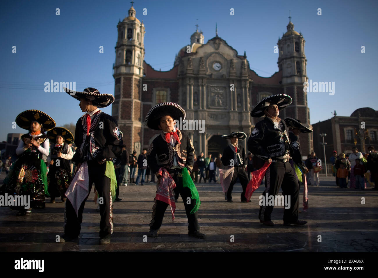 Pilgrims dance outside the Our Lady of Guadalupe Basilica in Mexico ...