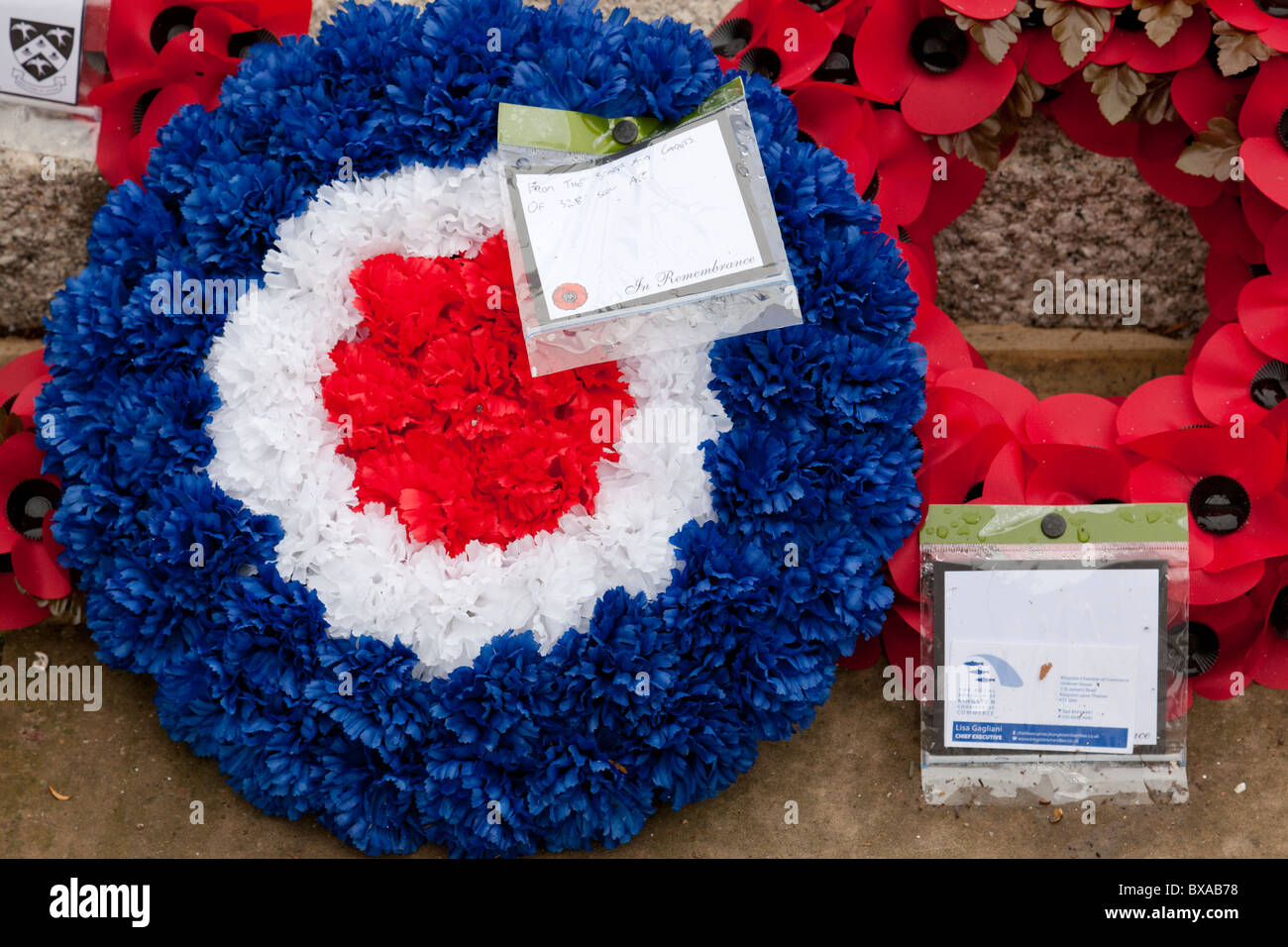 Wreaths alongside a war memorial Stock Photo - Alamy