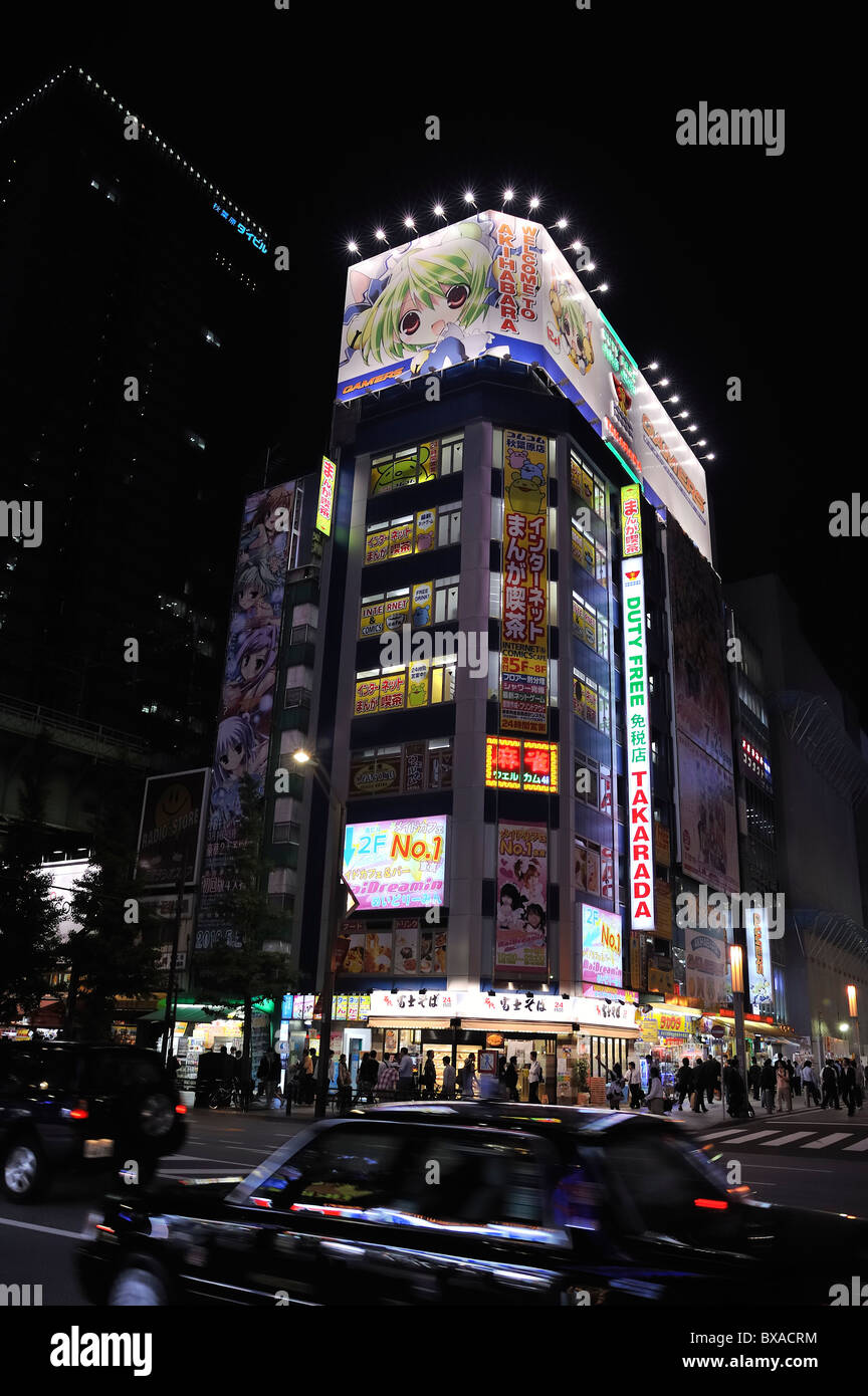 Building with heavy illumination and advertising in Akihabara at night ...