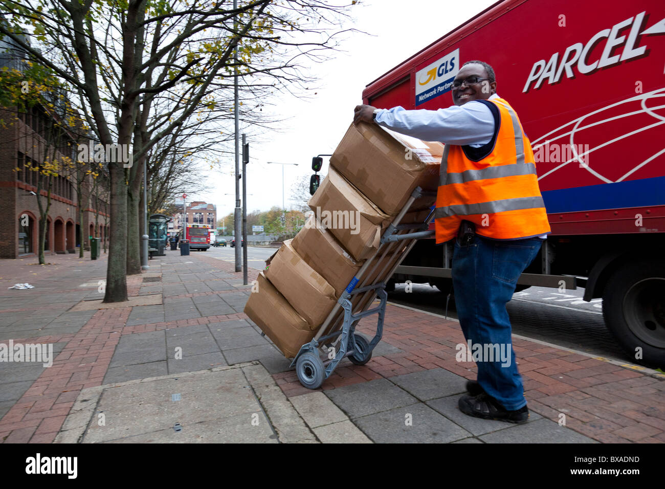Pushing a heavy load hi-res stock photography and images - Alamy