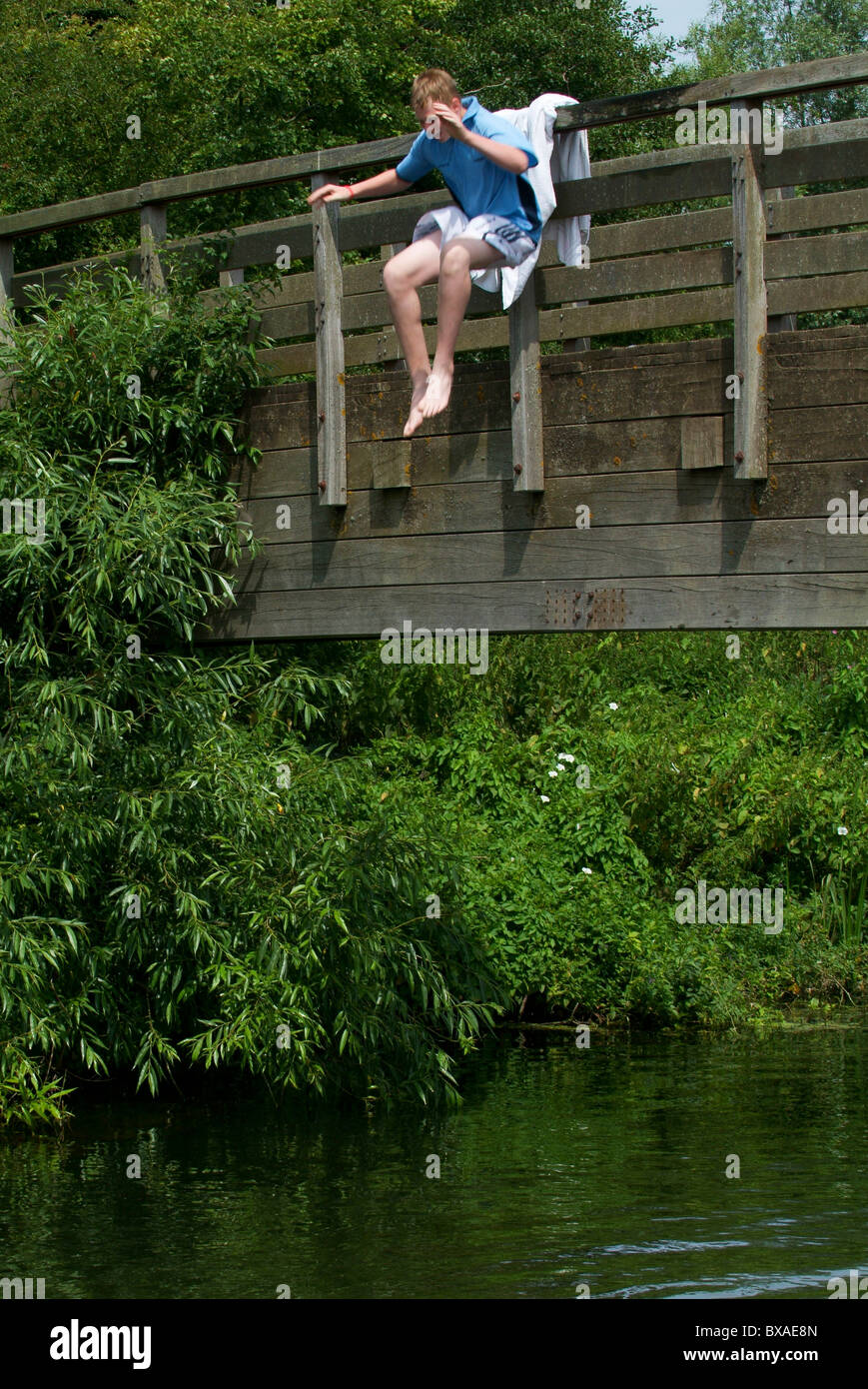Kids larking about in a river Stock Photo - Alamy