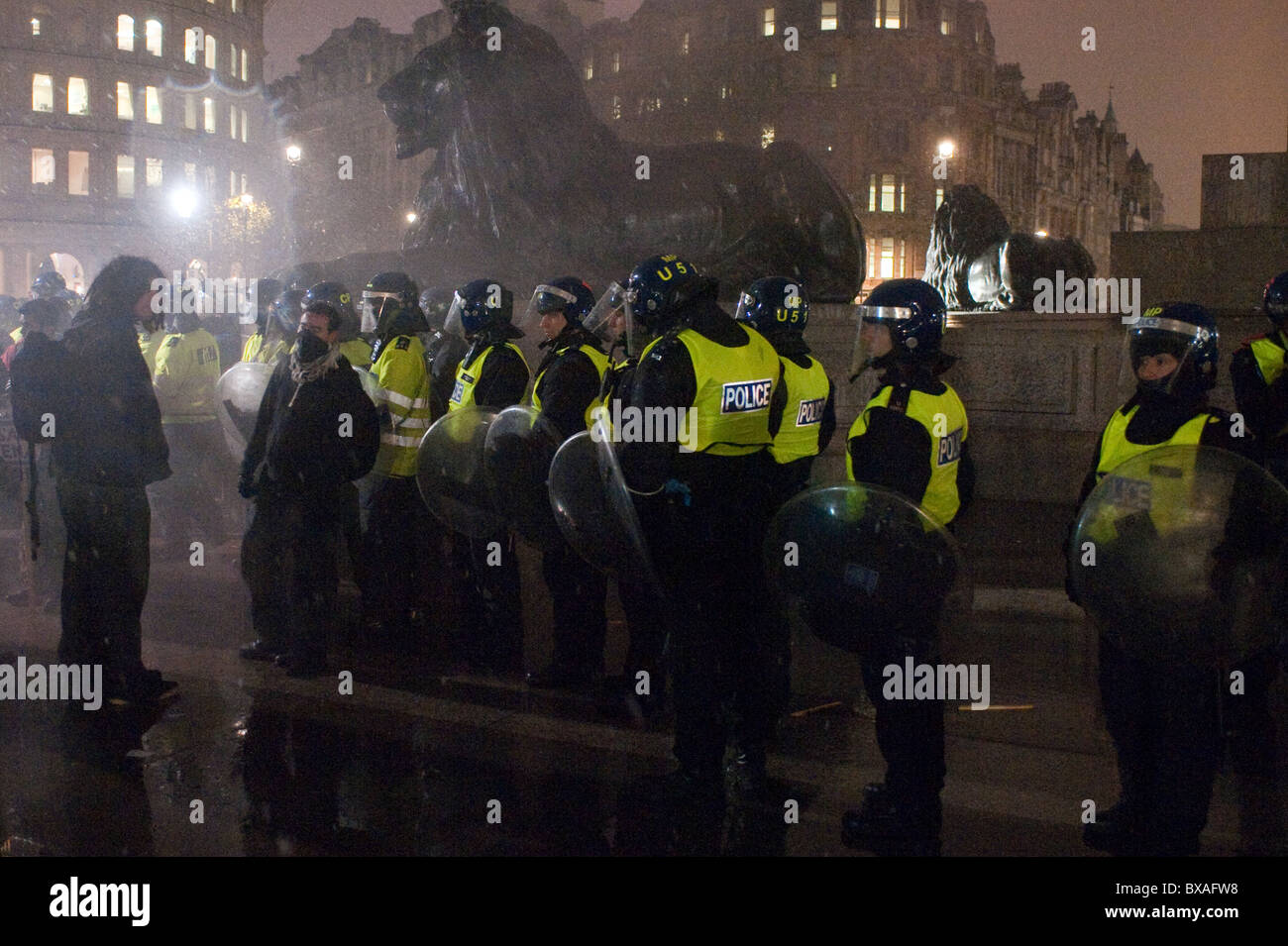 Metropolitan police officers, most in full riot protective uniform in ...