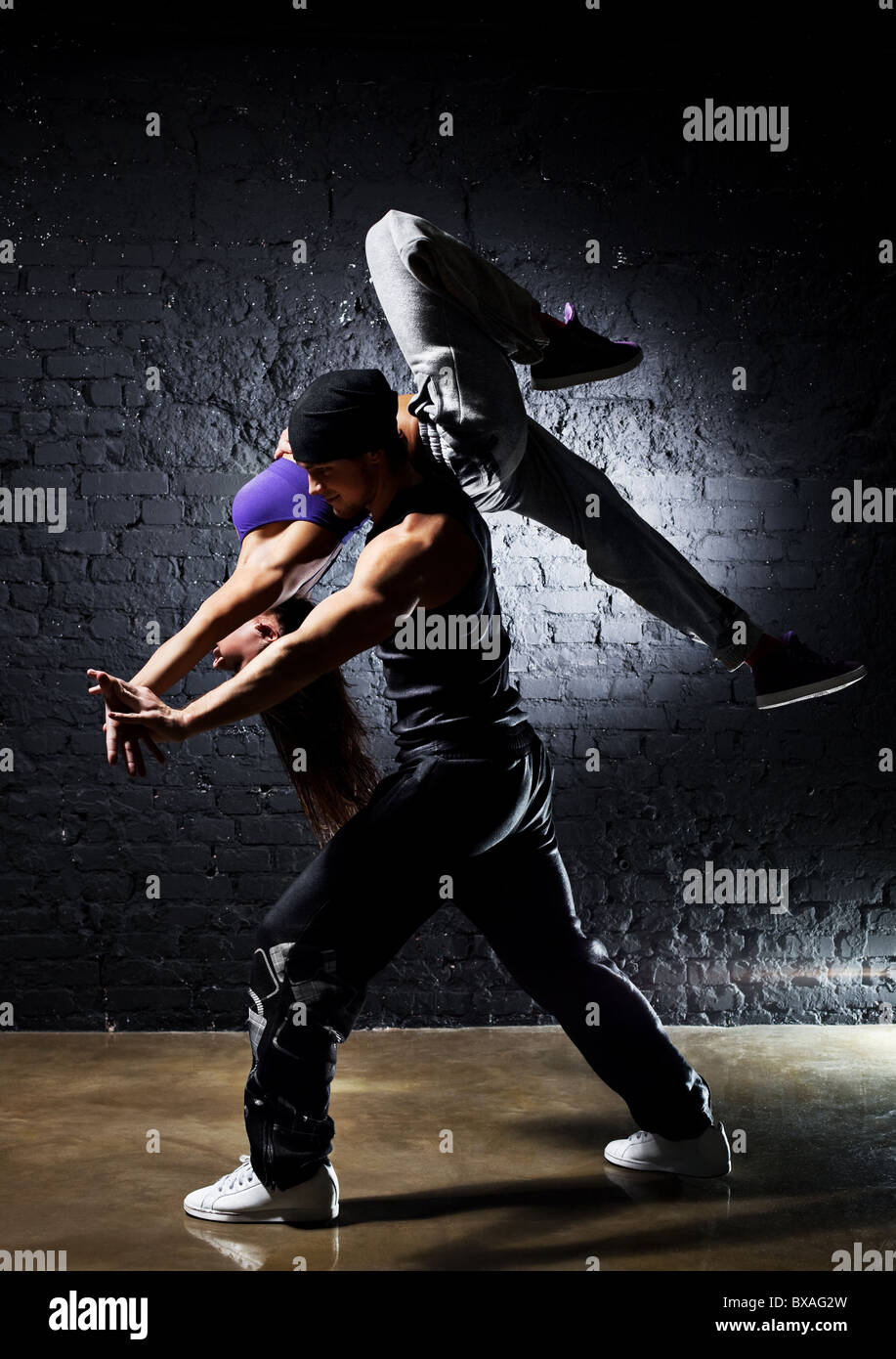 Dancer couple. Contrast colors effect Stock Photo - Alamy