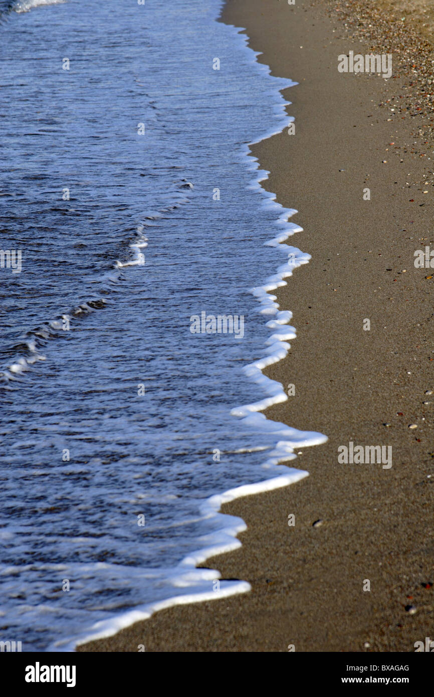 Water washing up on beach hi-res stock photography and images - Alamy