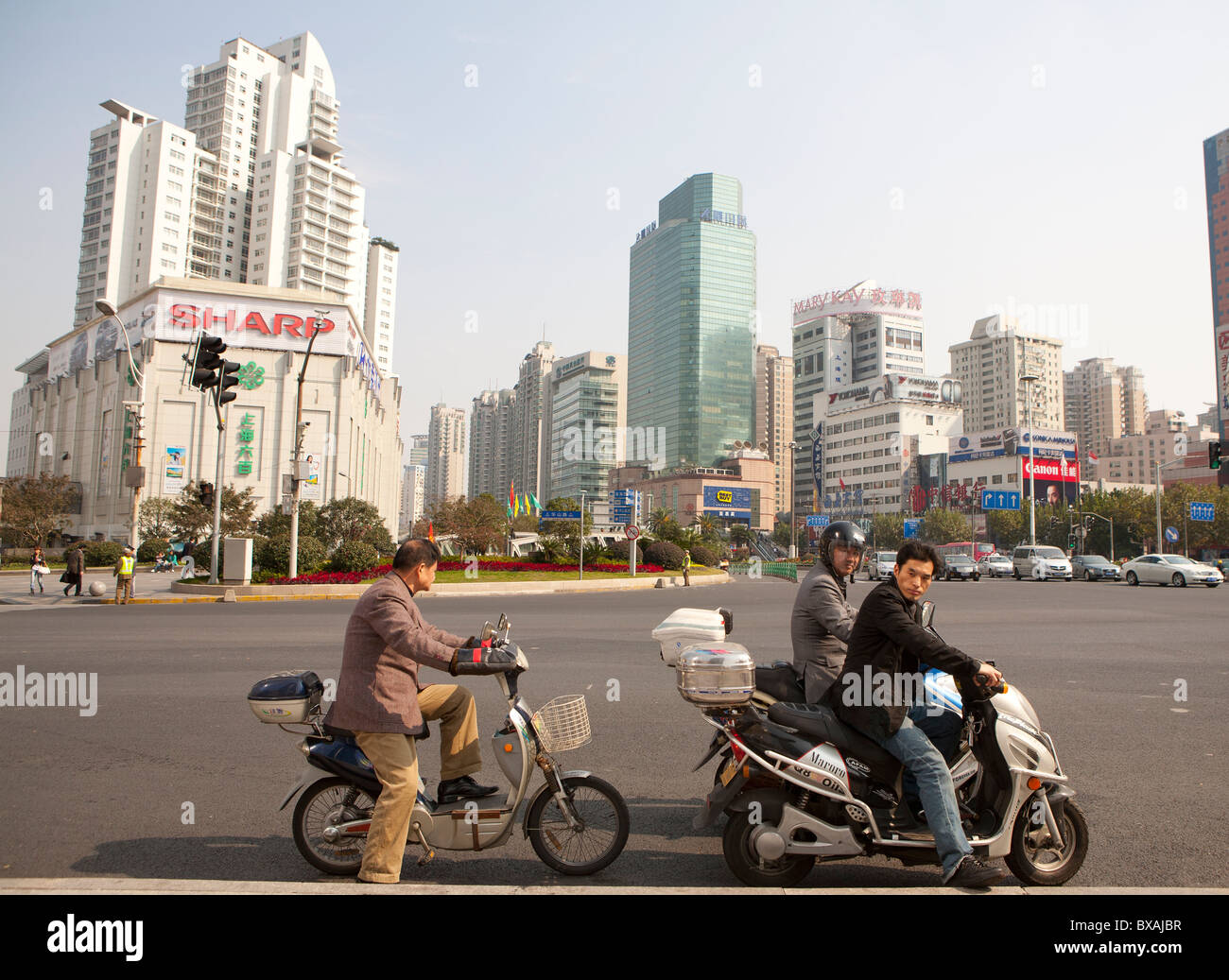 Motorbikes on road in city, Zhaojiabang Road, Shanghai, China Stock ...