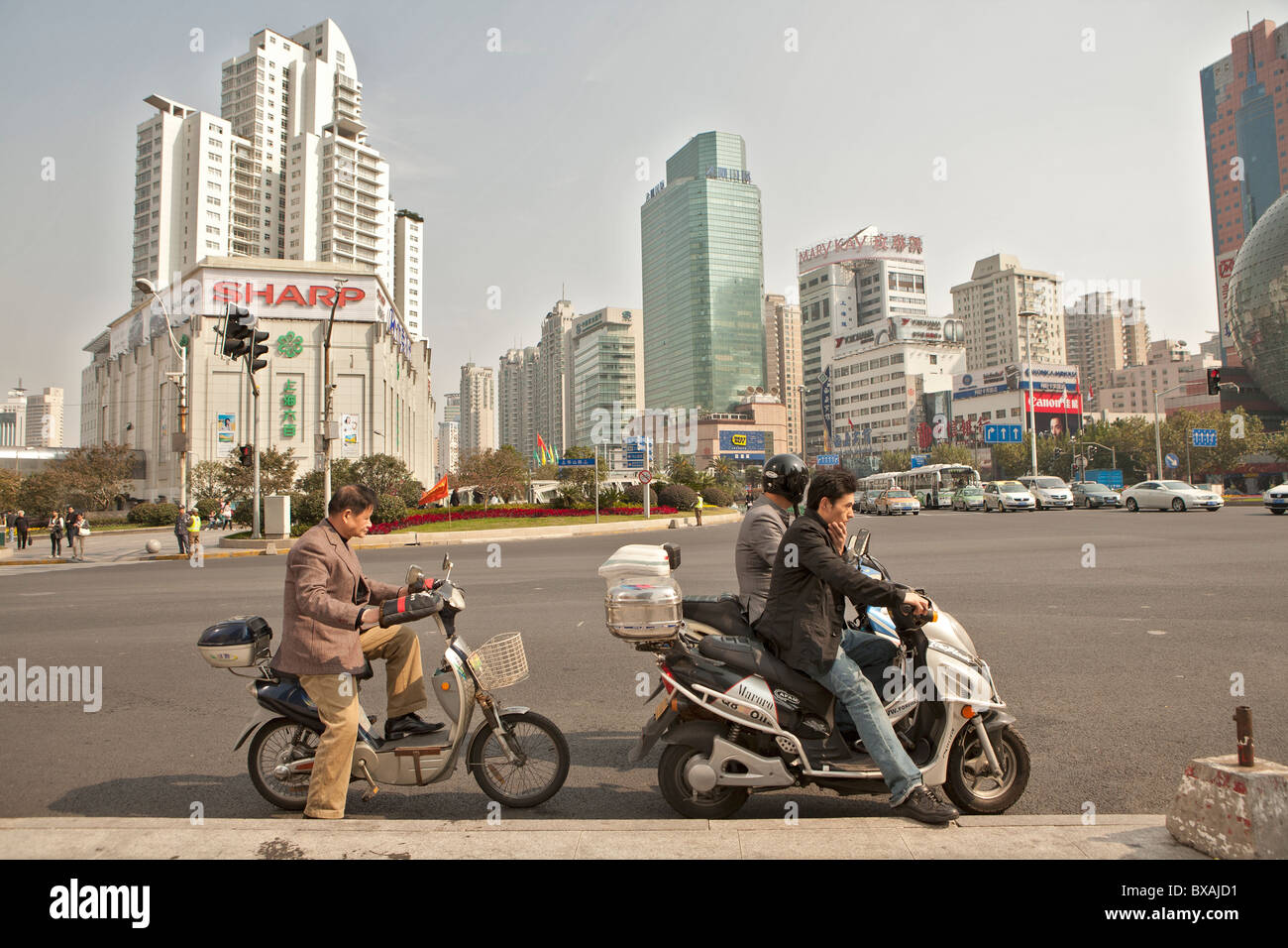 Motorbikes on road in city, Zhaojiabang Road, Shanghai, China Stock ...