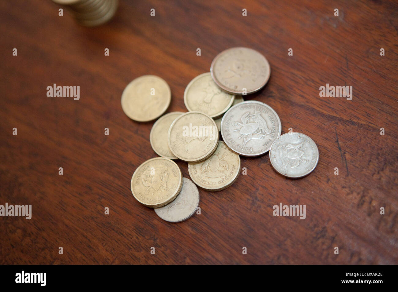 Coins - The Shilling is the unit of currency in Uganda Stock Photo - Alamy